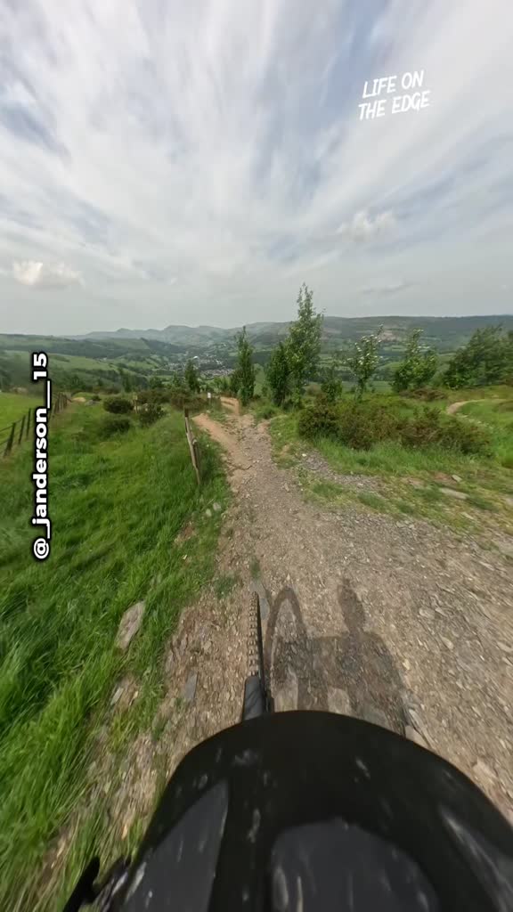 POV footage captures fast-paced downhill mountain bike run
