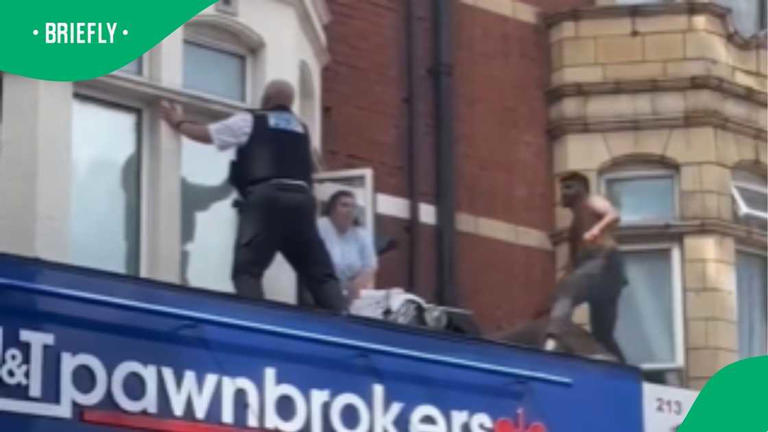 Child rescued from window ledge in East London after dramatic police ...