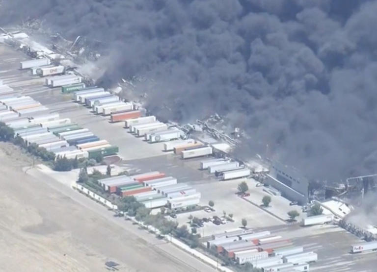 Tracy medical warehouse fire sends plumes of black smoke into air as ...