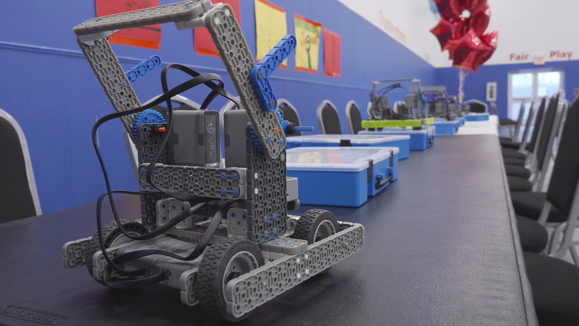 Club kids battle robots at annual Boys and Girls Club robotics competition