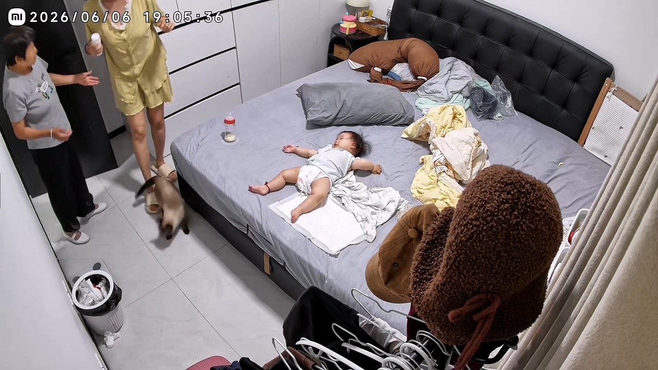 Cat surprised after stepping on baby!