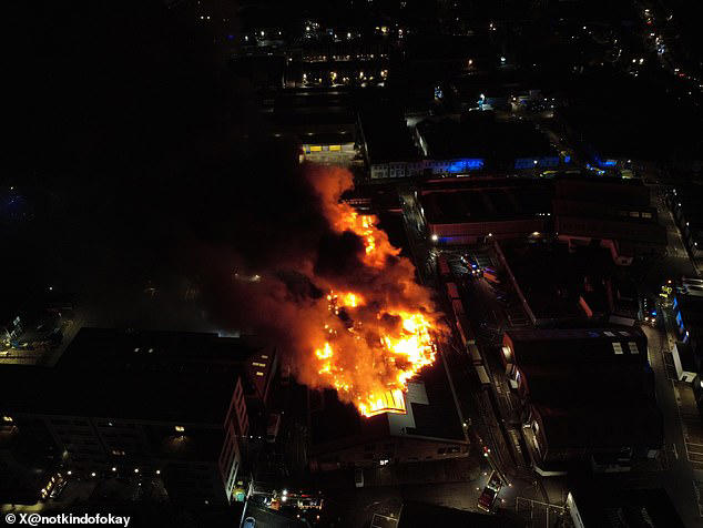 Huge fire erupts at London warehouse as 150 firefighters rush to tackle ...