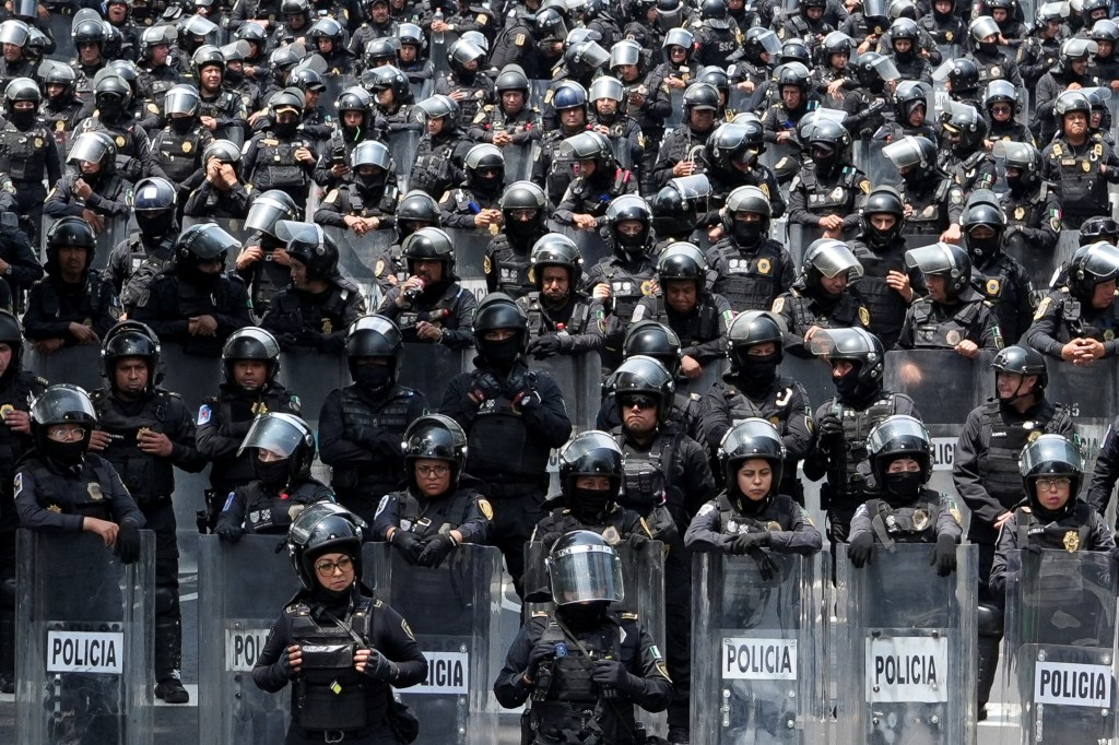 Violent protests erupt outside Mexico City stadium in wild scene on ...
