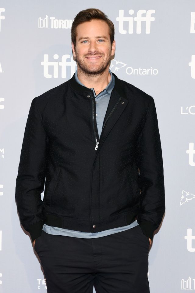 Armie Hammer is seen kissing a mystery woman during rare public outing