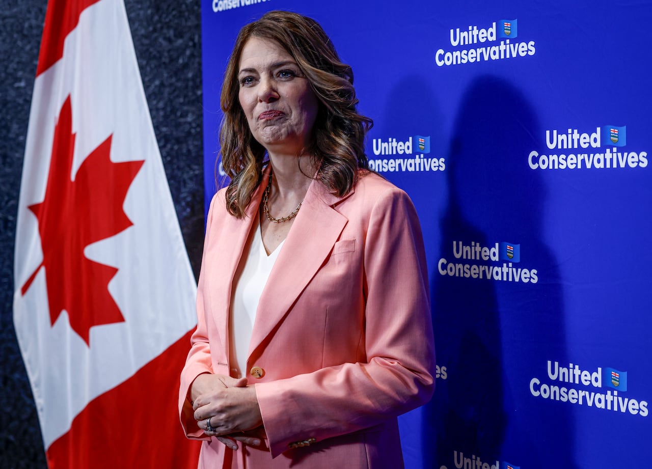Behind federalist Danielle Smith, many of her party's senior organizers ...