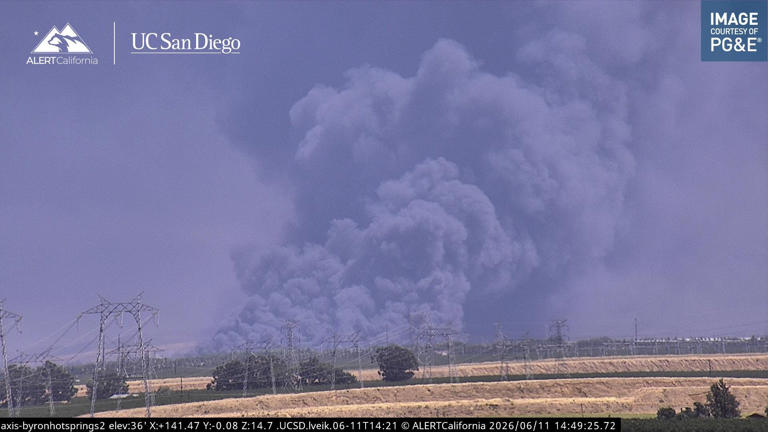 Massive fire engulfs Tracy warehouse, threatens second building