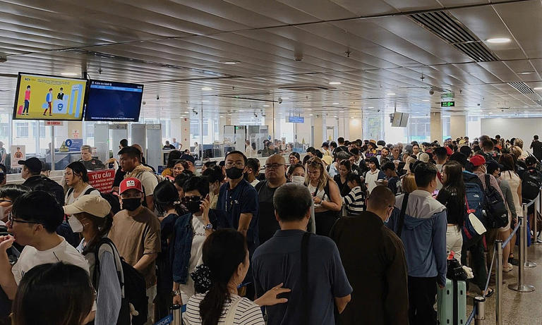 Passengers stuck for hours as storm diverts Ho Chi Minh City flights to ...