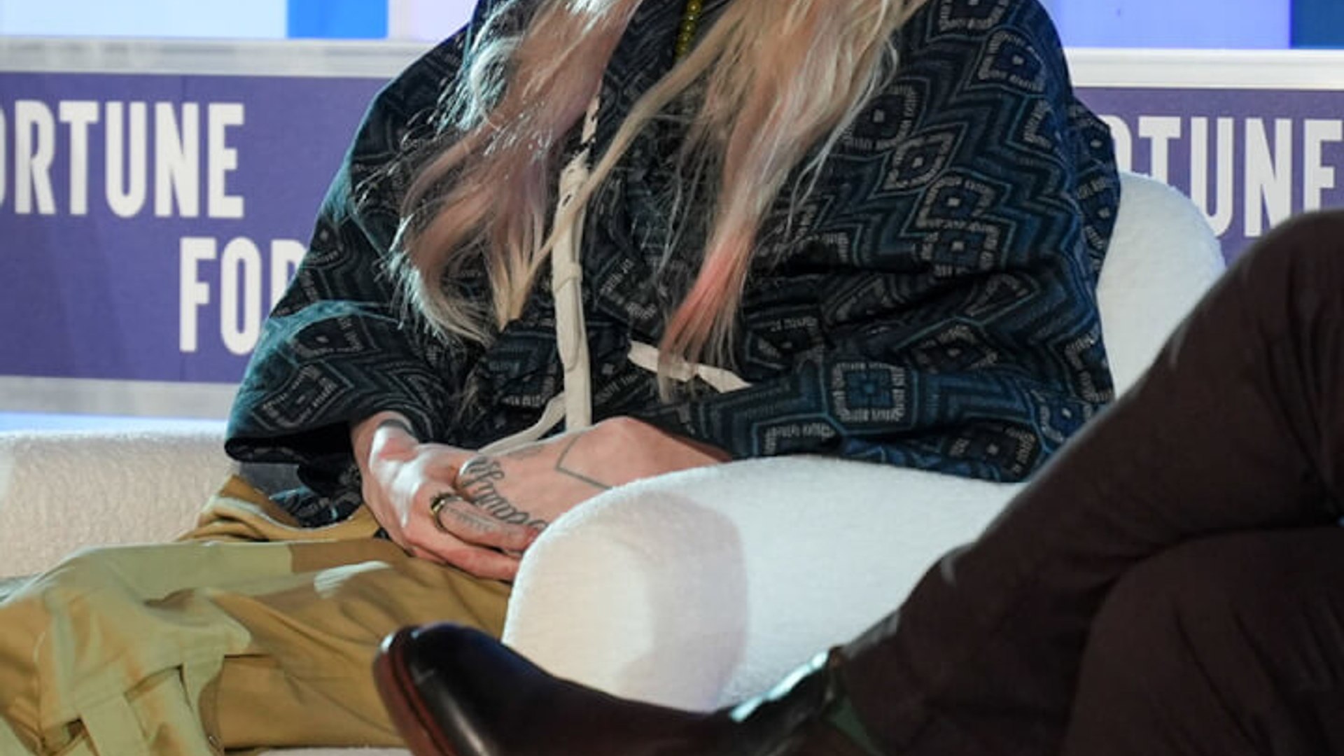 Grimes: AI music slop is flooding Spotify, but it's a win for artists
