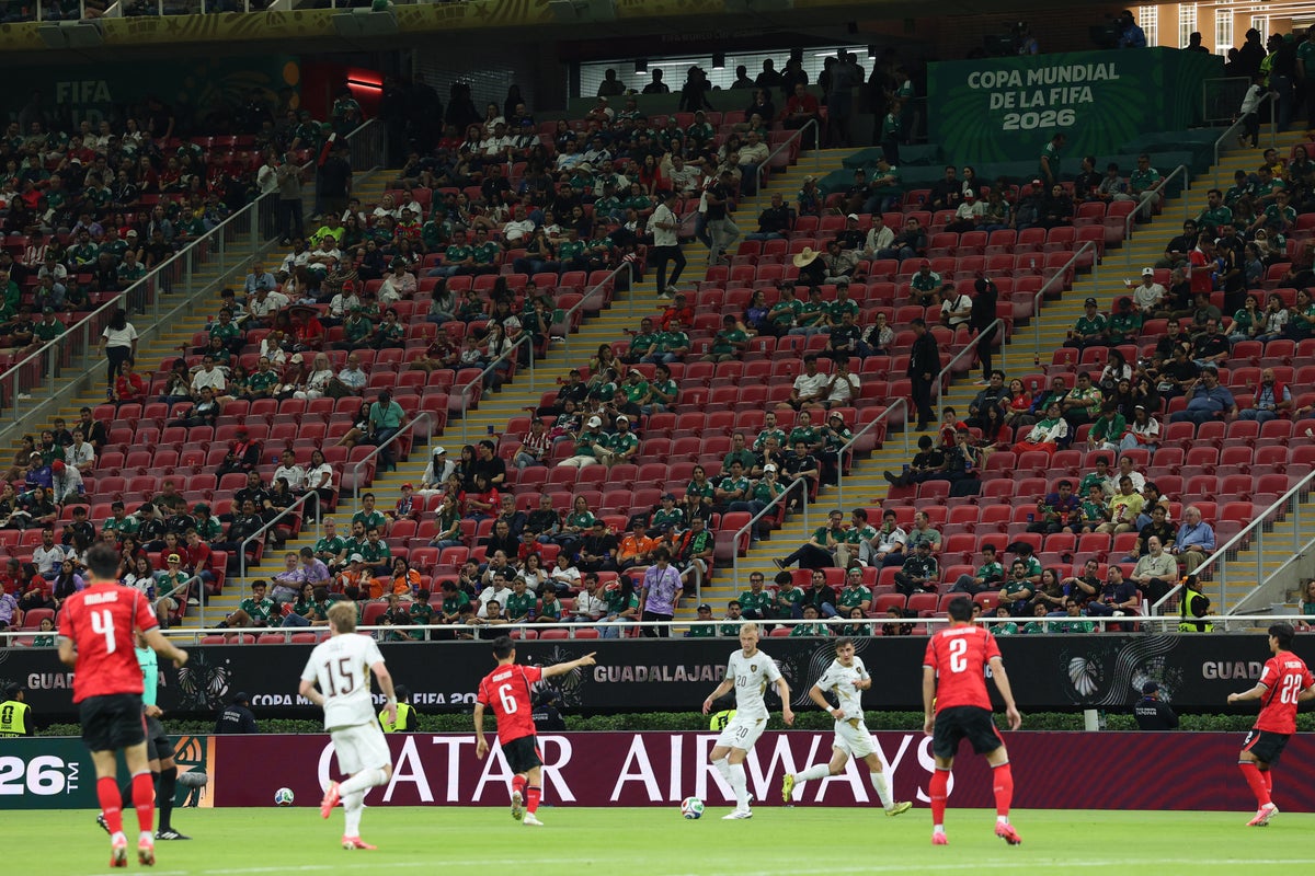 Empty seats and World Cup water breaks takes shine off opening games