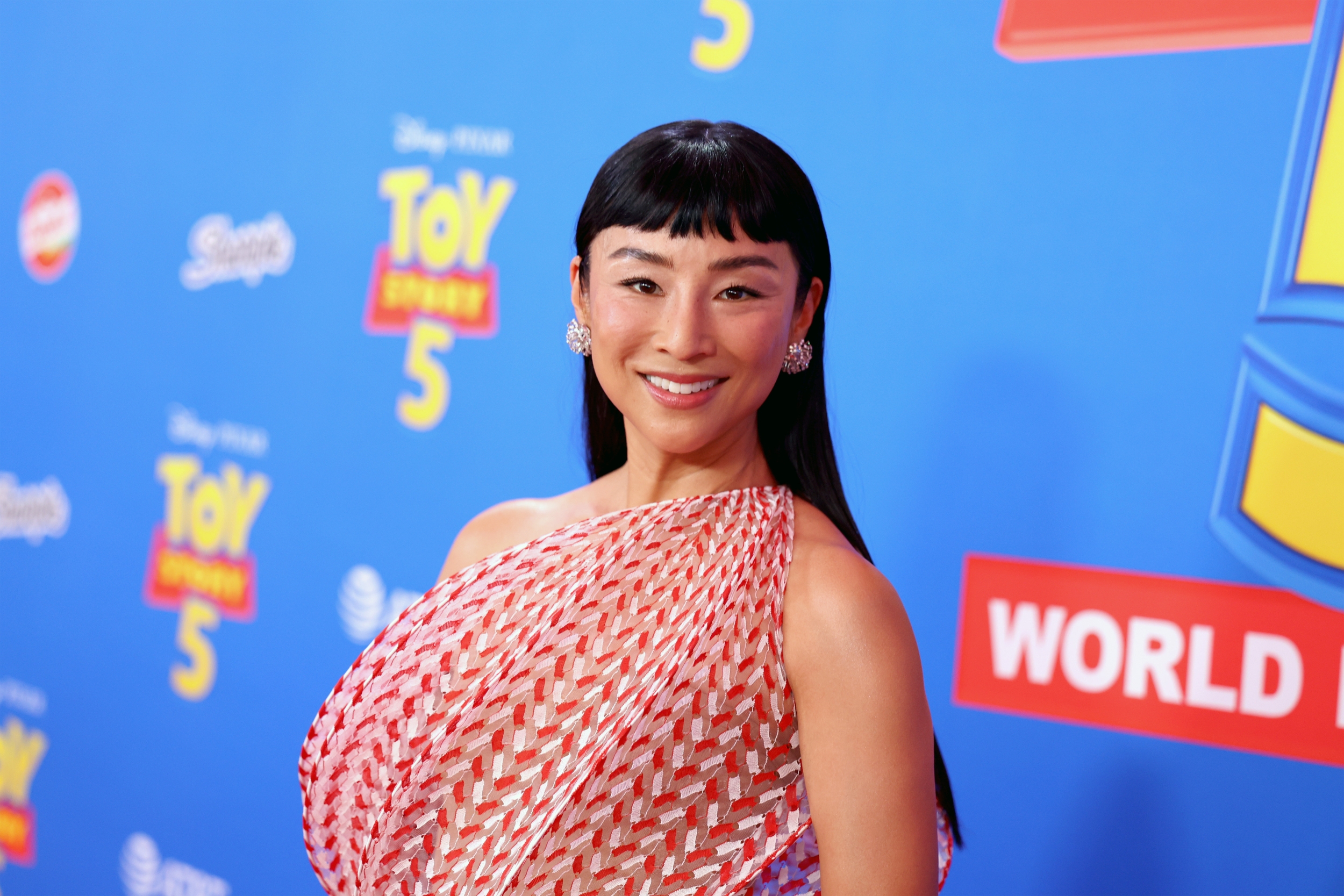 Greta Lee captivates in ballooning Dior couture dress at the 'Toy Story ...