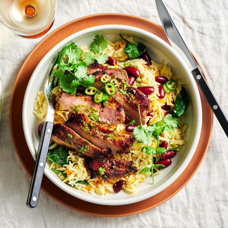 Mojo pork sirloin with coconut and carrot rice