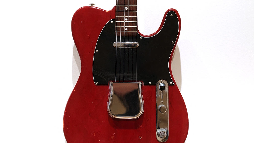 From early experiments to modern electric guitars