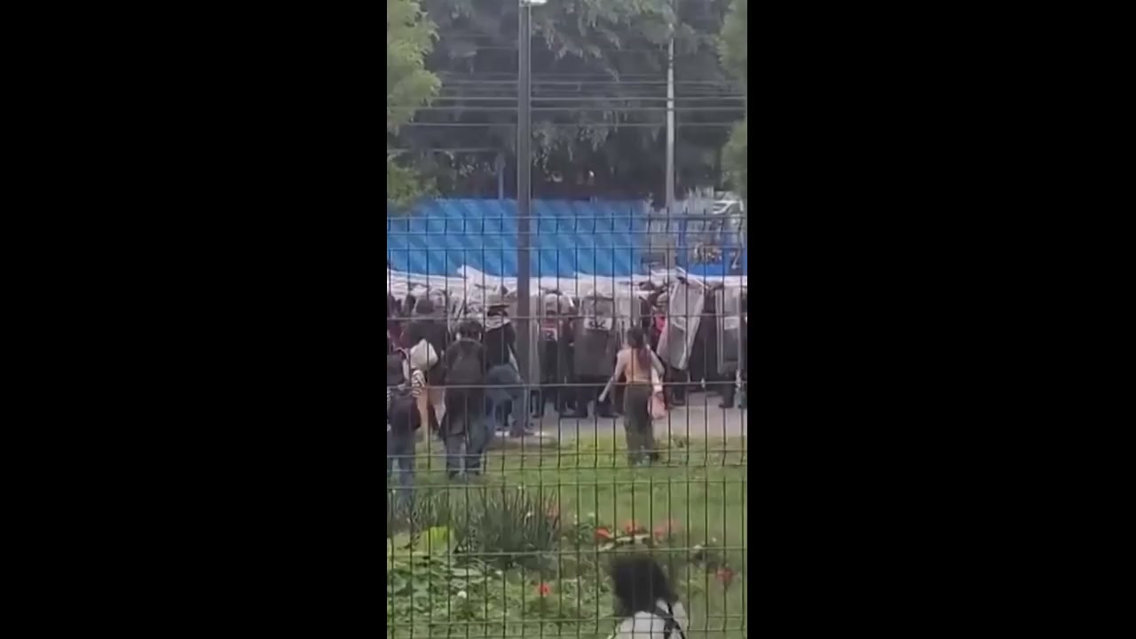 Riot police block protesters at World Cup ceremony
