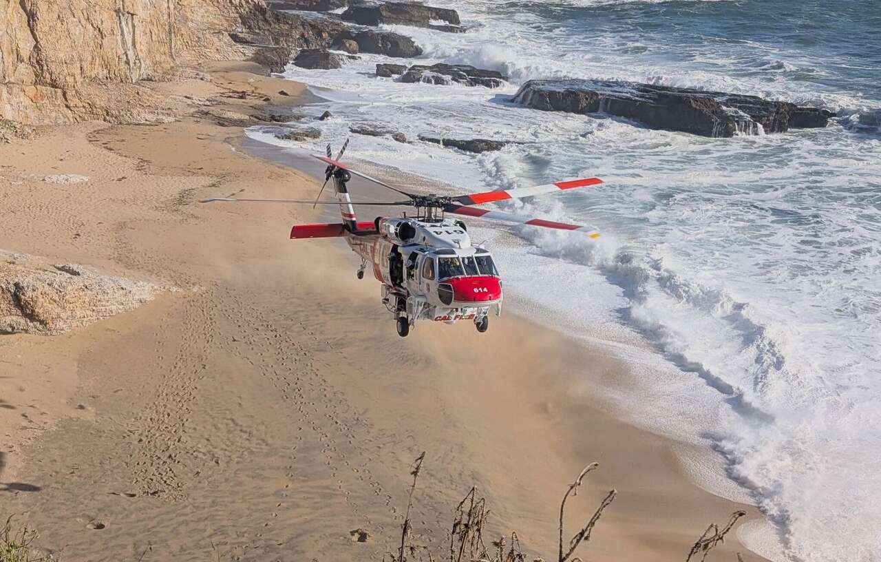 Tide sweeps 2 sleeping beachgoers into ocean near Santa Cruz