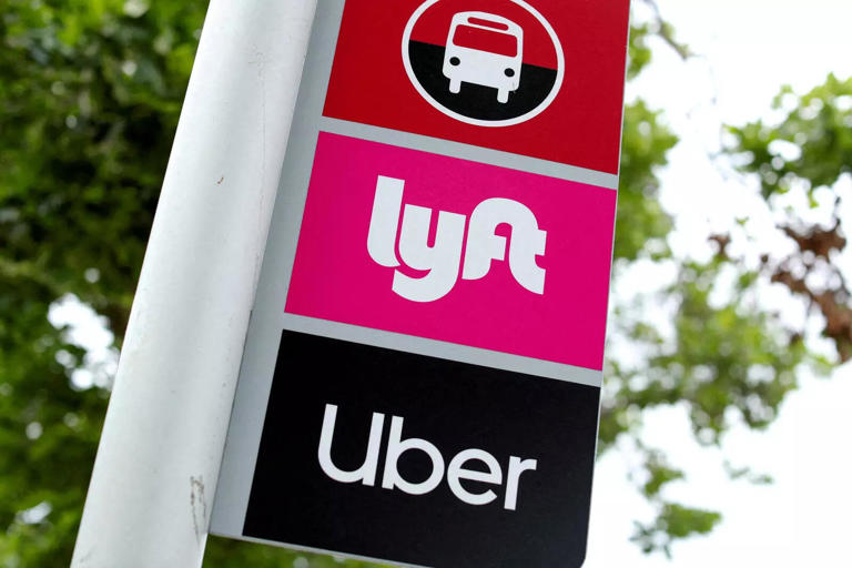 Lyft, Uber sue New York City to block driver retention law
