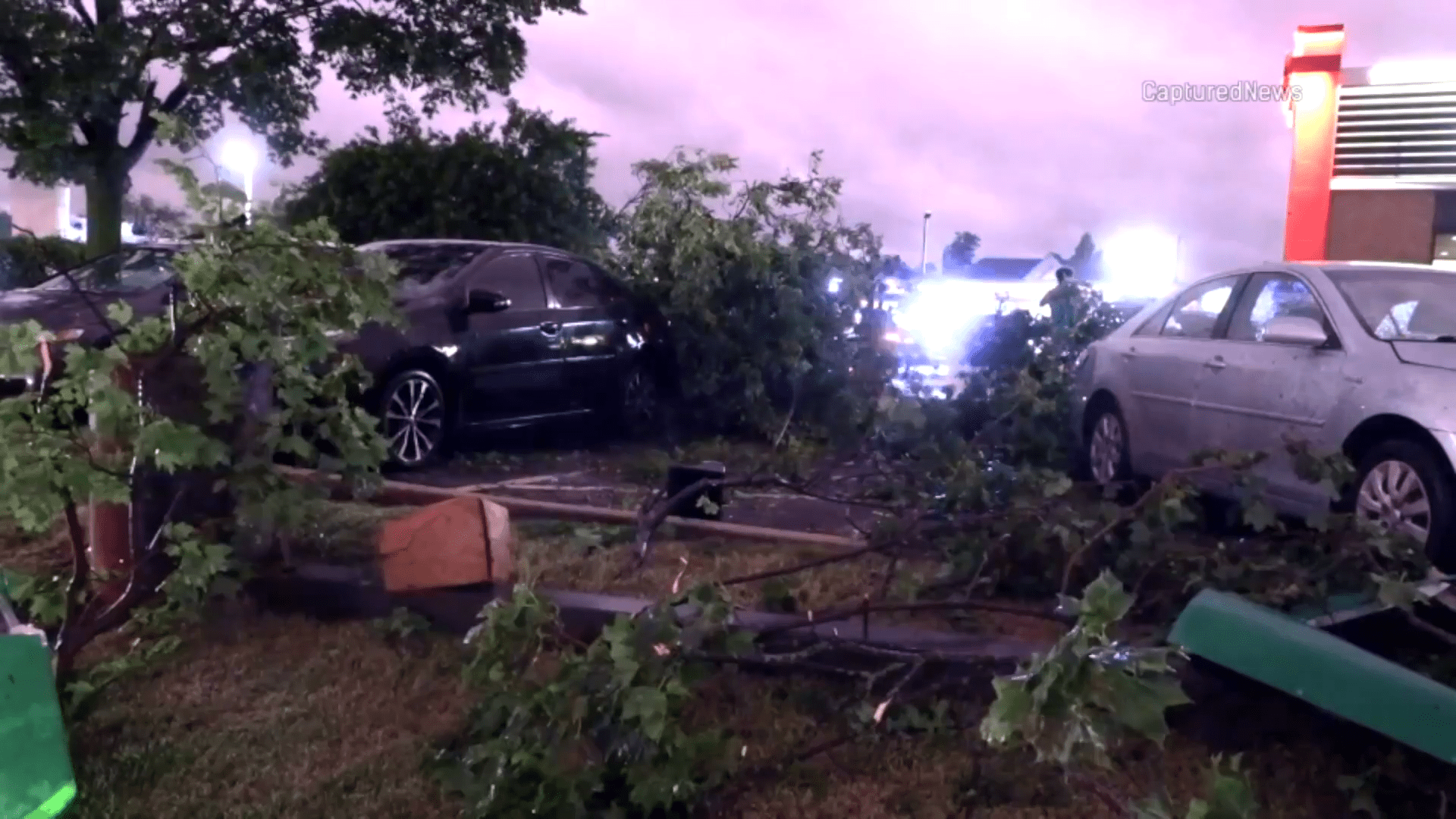 Watch: Strong winds, possible tornado scatter damage across suburban ...