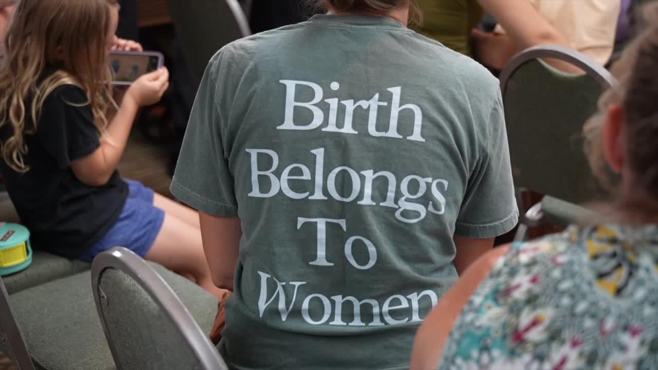 Community packs meeting to fight birth center closure
