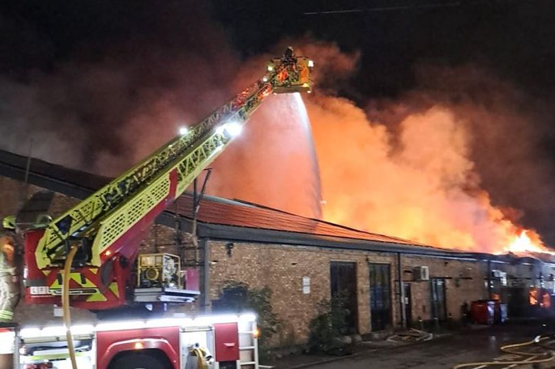 Homes evacuated overnight as 150 firefighters tackle warehouse blaze
