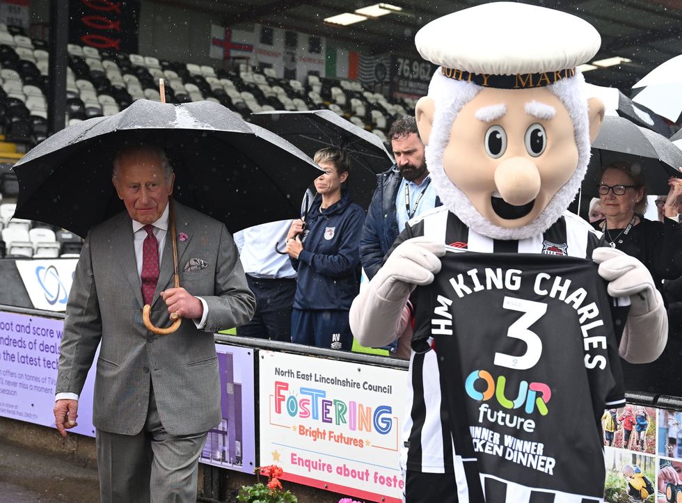 King Charles delighted as he is receives personalised football shirt ...
