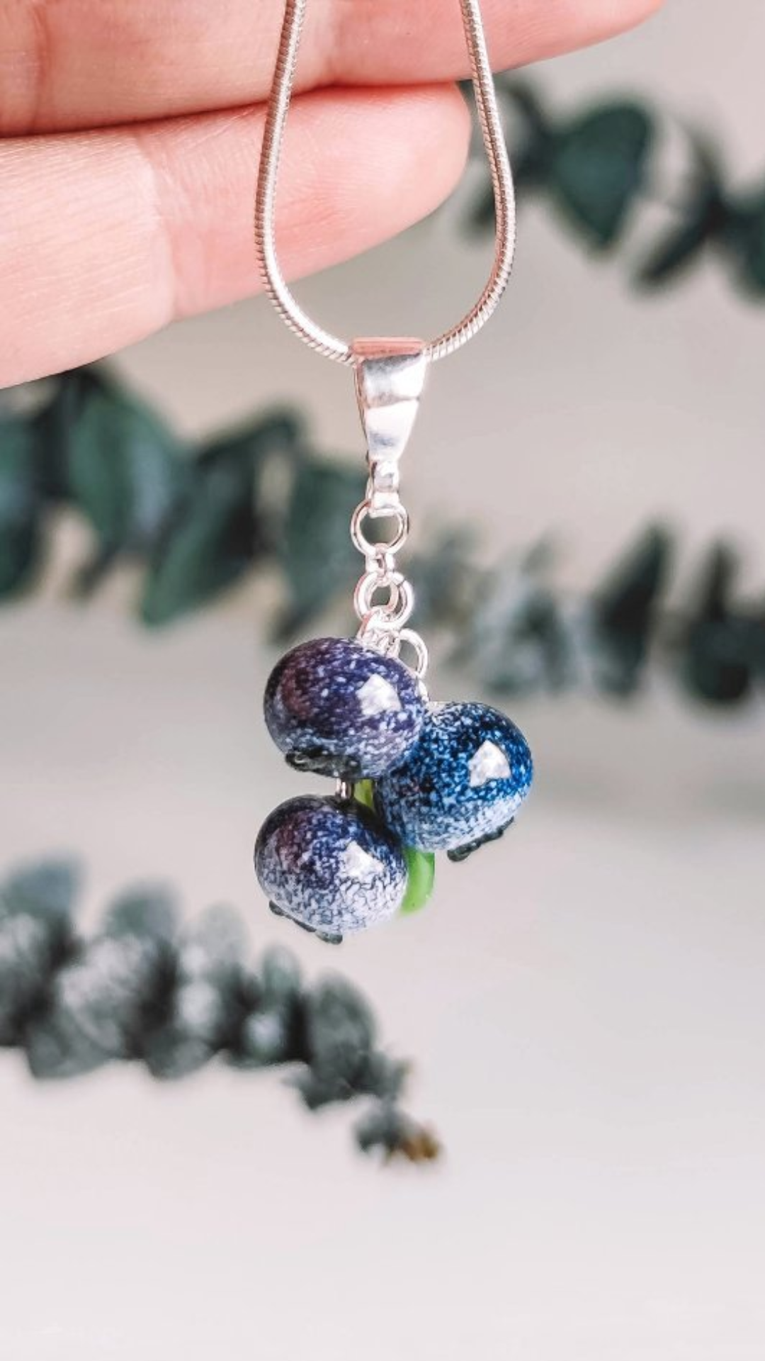 Watch dark glass transform into realistic blueberries