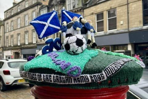 Kirkcaldy’s anonymous knitters add World Cup themed topper to post box