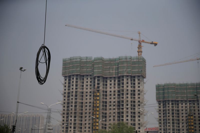 China's new loans miss forecasts in May as property slump curbs demand