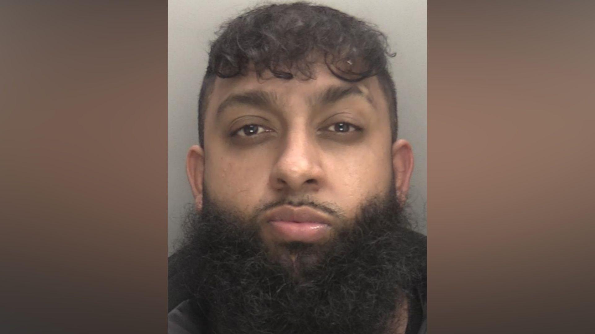 Petrol station worker jailed as guns stash found