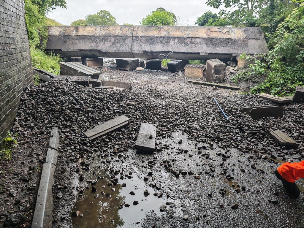 Rail bridge collapses on main line into central London