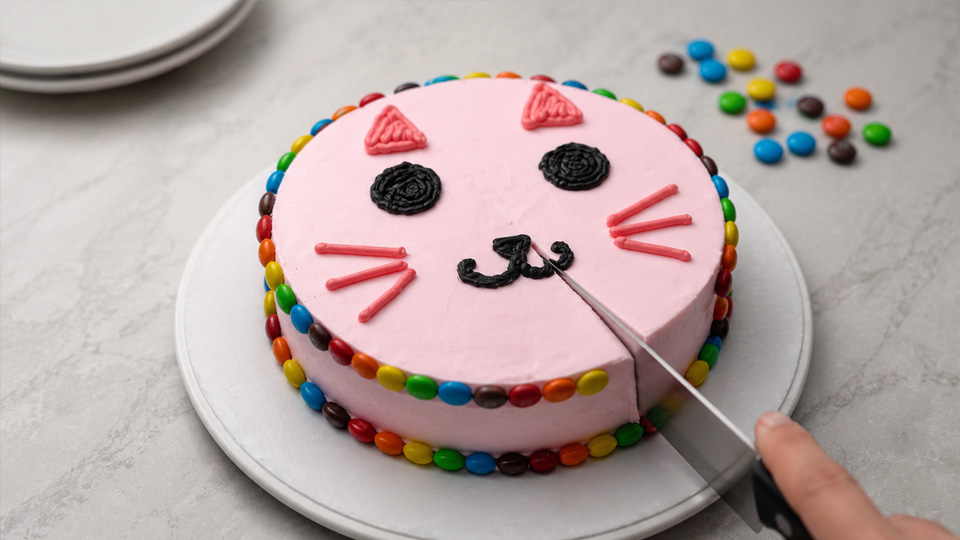 Pink cat cake gets a cute candy finish