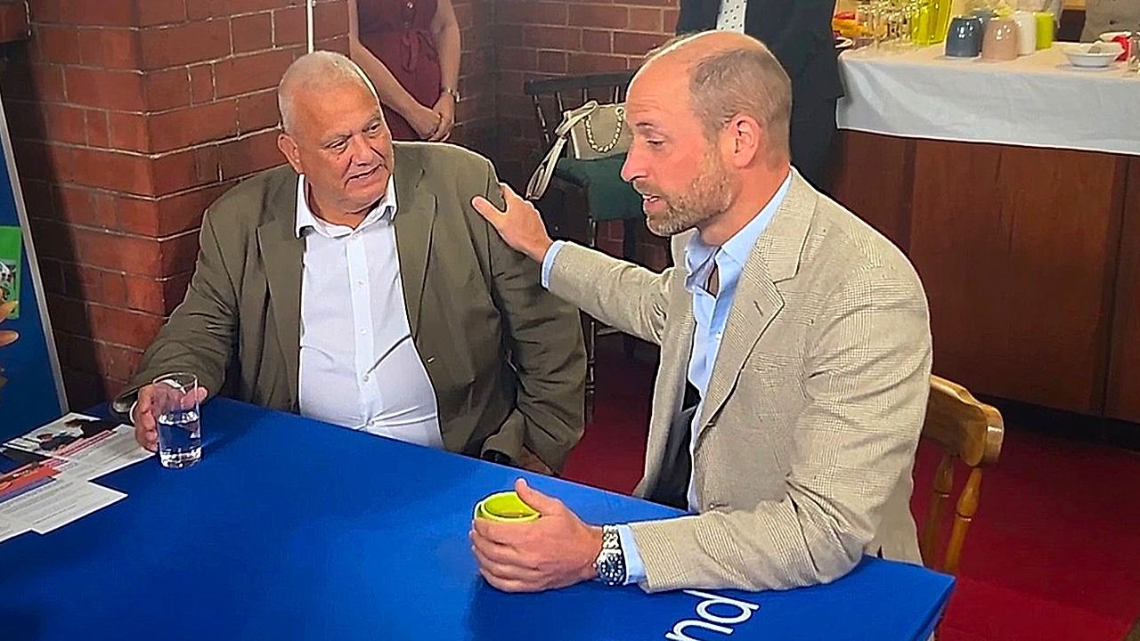 Prince William comforts man during visit to men's mental health group