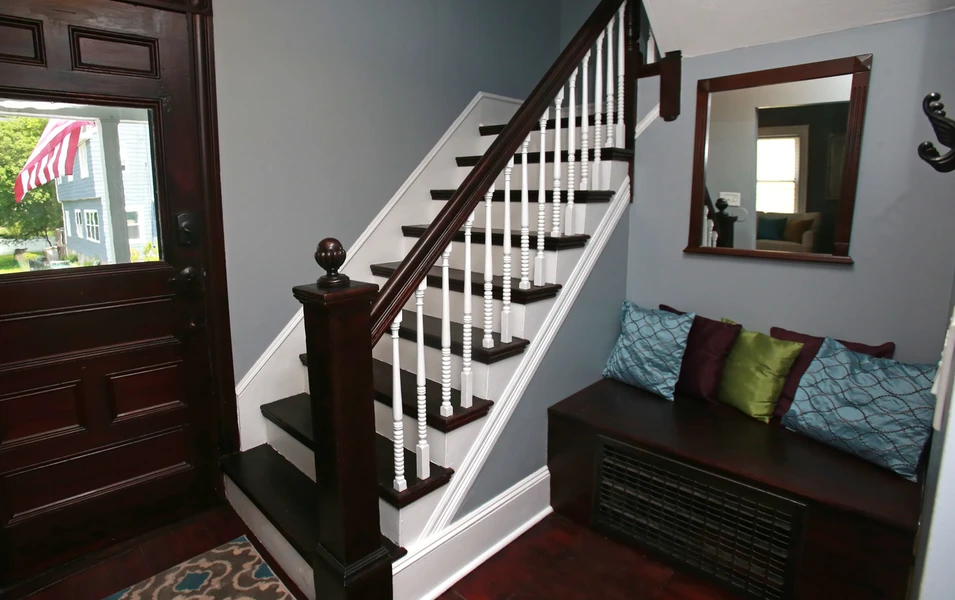 Country Living shares functional style ideas for small entryways