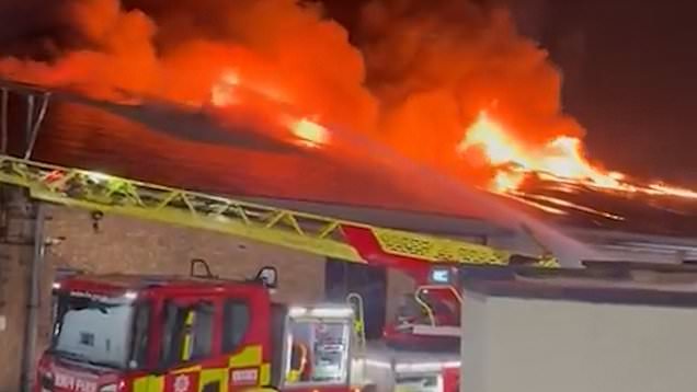 Fire burns through Brent warehouse