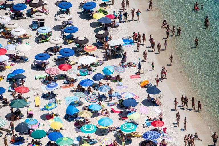 Sardinian beach bans umbrellas for 10 to 65-year-olds
