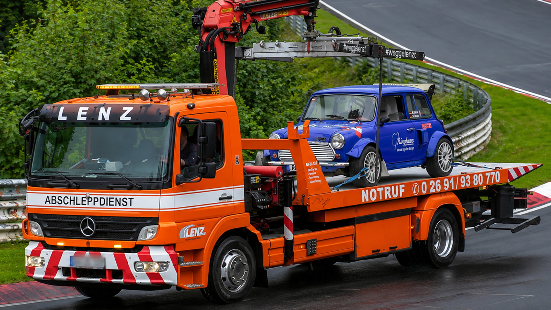 Recovery trucks stay busy during a slippery track session