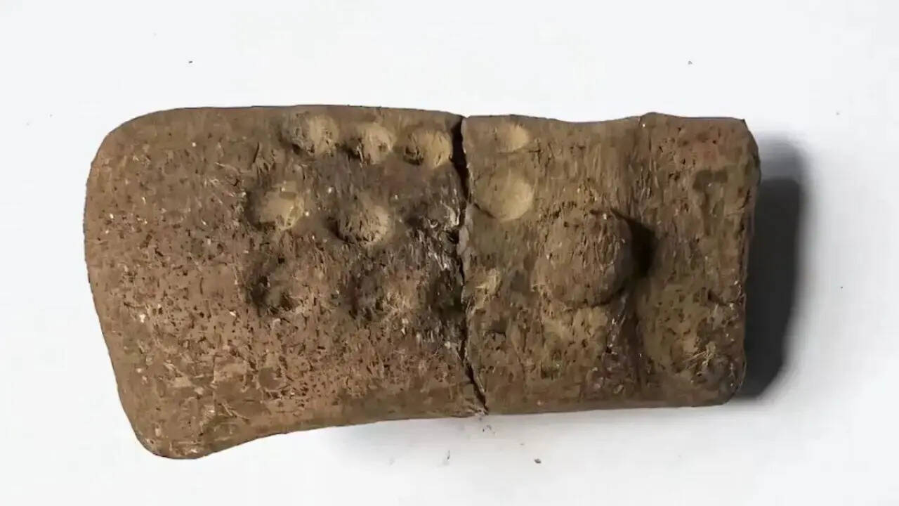 11 mysterious dots on a 2,700-year-old figurine are forcing ...