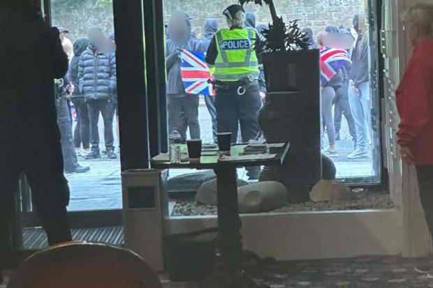 MP hits out at 'disgraceful' scenes at hotel outside Glasgow after ...
