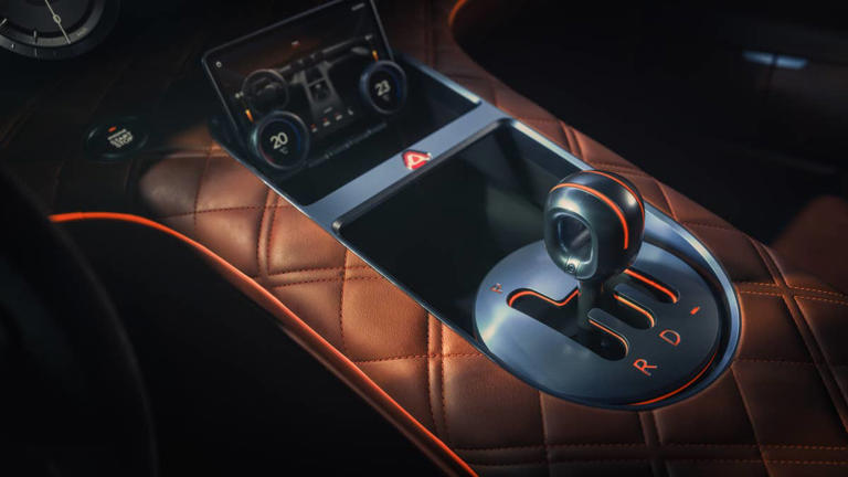Genesis’ V8 supercar finally shows off its gorgeous analog interior