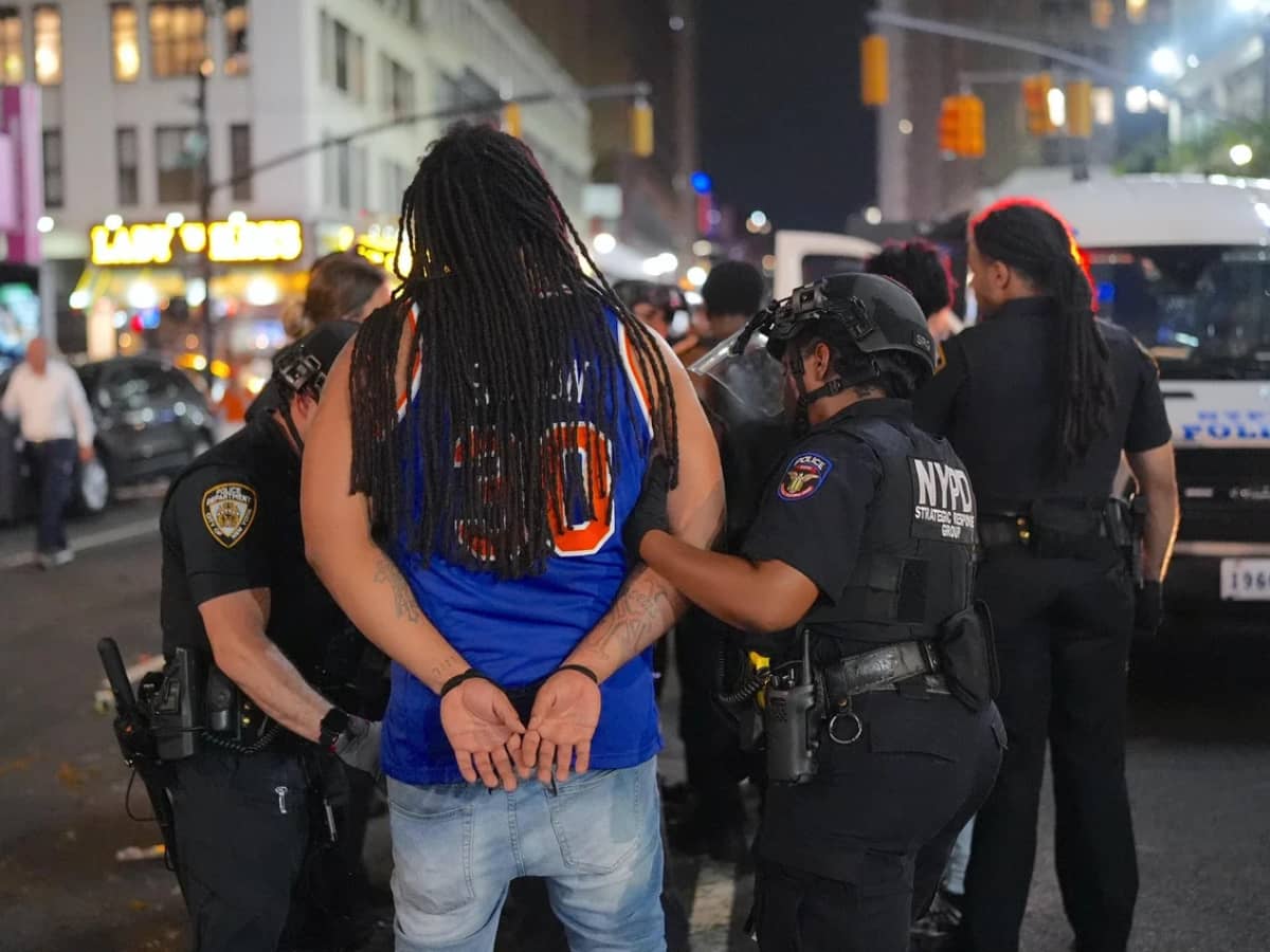 NYPD took 56 people into custody as 10 officers were left injured after ...