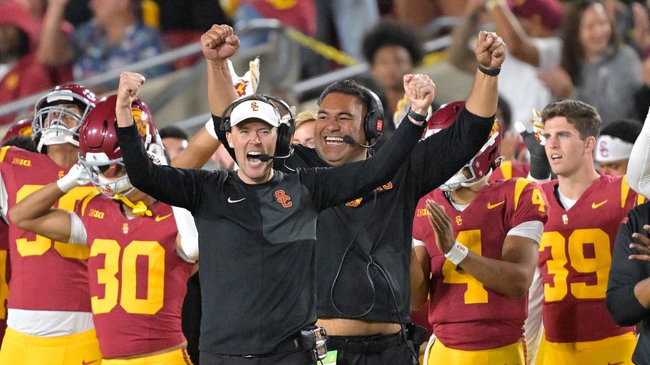 Which college football head coach on the hot seat is recruiting the best?