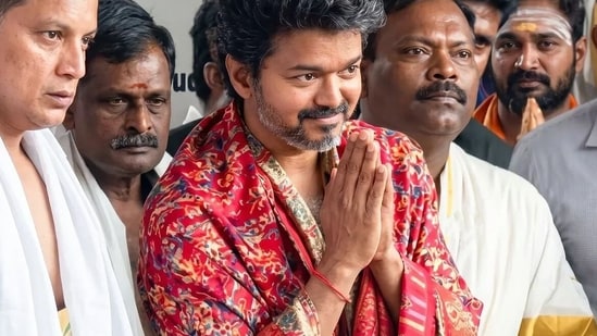 Sobbing female fan follows TN CM C Joseph Vijay's car as he drives ...