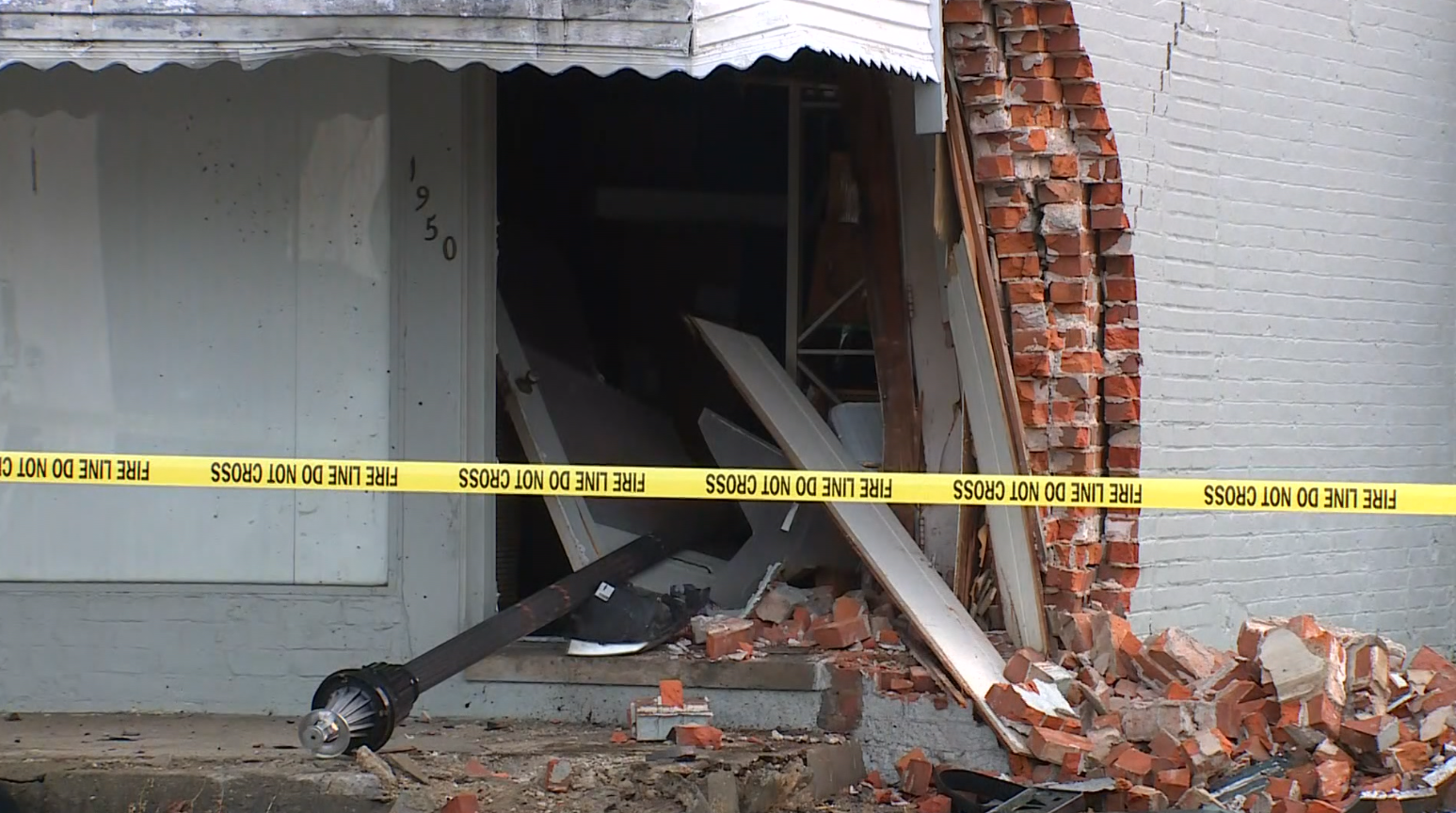 No one injured after car slams into unoccupied North College Hill building
