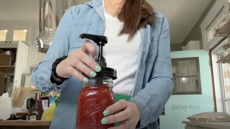 Turn Dollar Tree glass jars into adorable ketchup and mustard dispensers