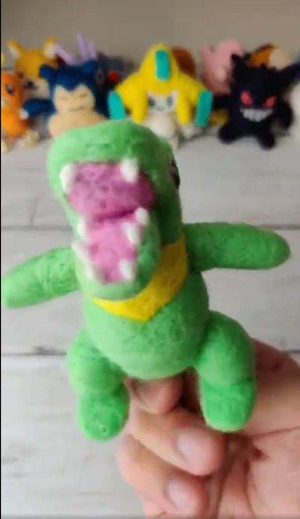 Shiny Totodile Pokémon wool art with a satisfying finish