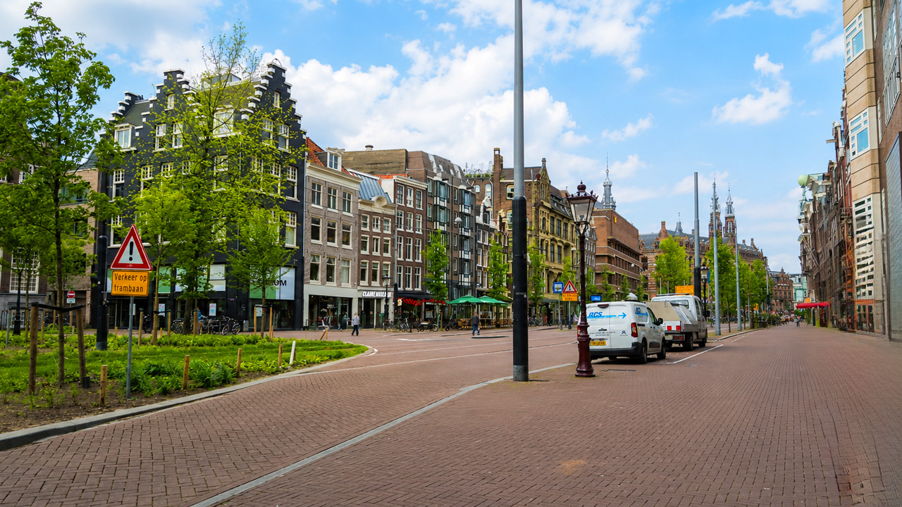 Amsterdam cloudy walk through central city streets