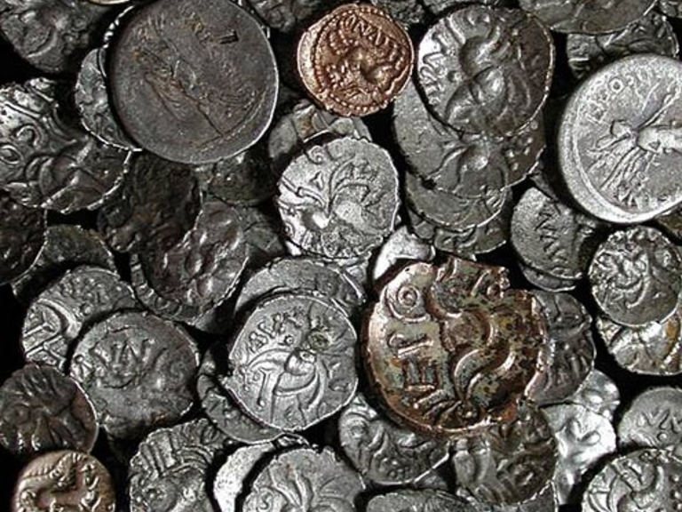 In 2000, a metal detectorist found ancient coins on an English hilltop ...