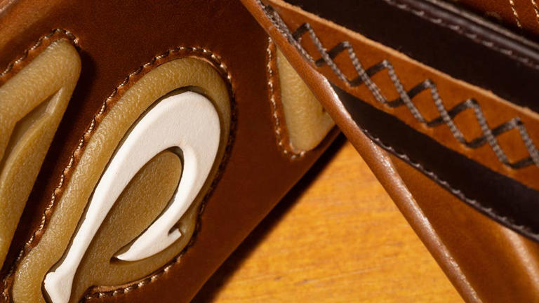 Travis and Jason Kelce's new sandals feature football-inspired design ...