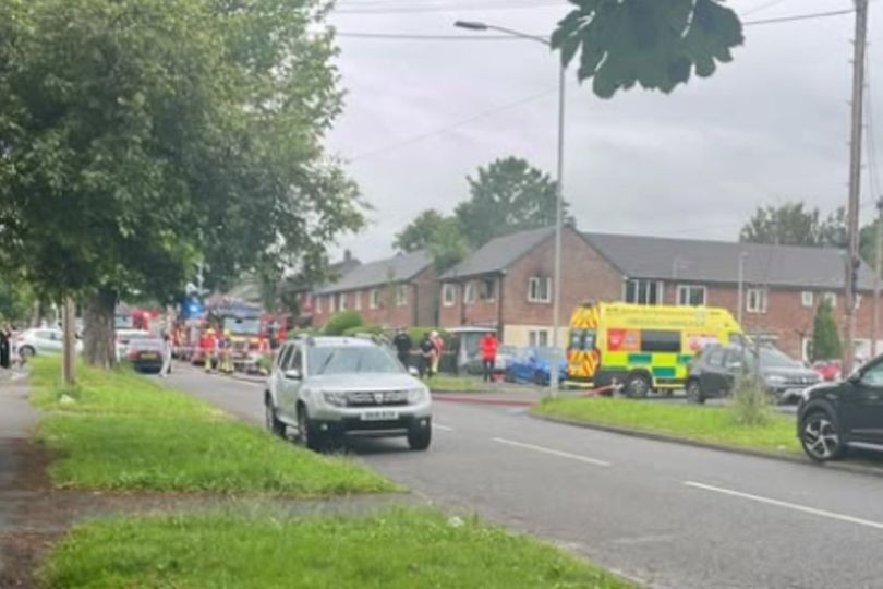 Wythenshawe road taped off after electric bike bursts into flames at house