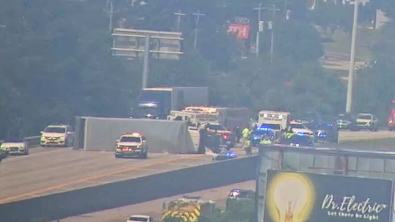 Overturned tractor-trailer stalls traffic on I-20 near Jimmie Dyess Parkway