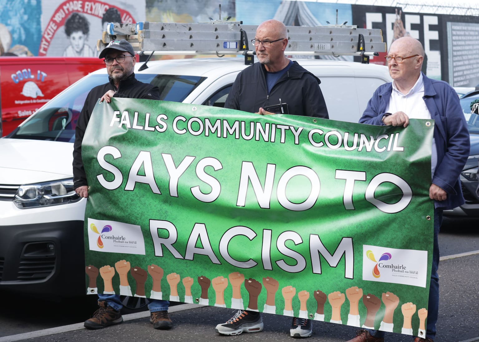 Anti-racism rally in west Belfast hears community must stand together ...