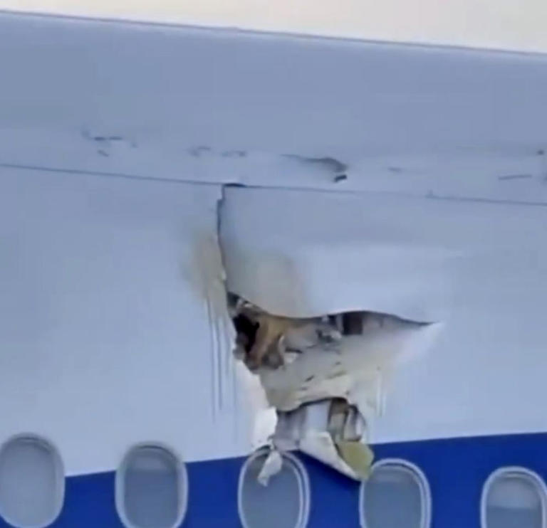 Plane with 267 passengers on board crashes into radar tower after ...